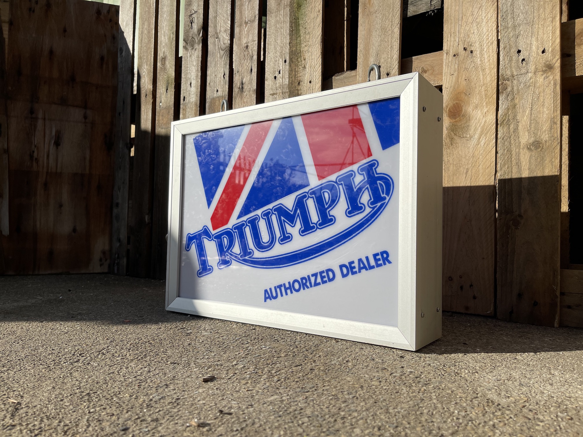 TRIUMPH DOUBLE SIDED ILLUMINATED DEALERSHIP SIGN